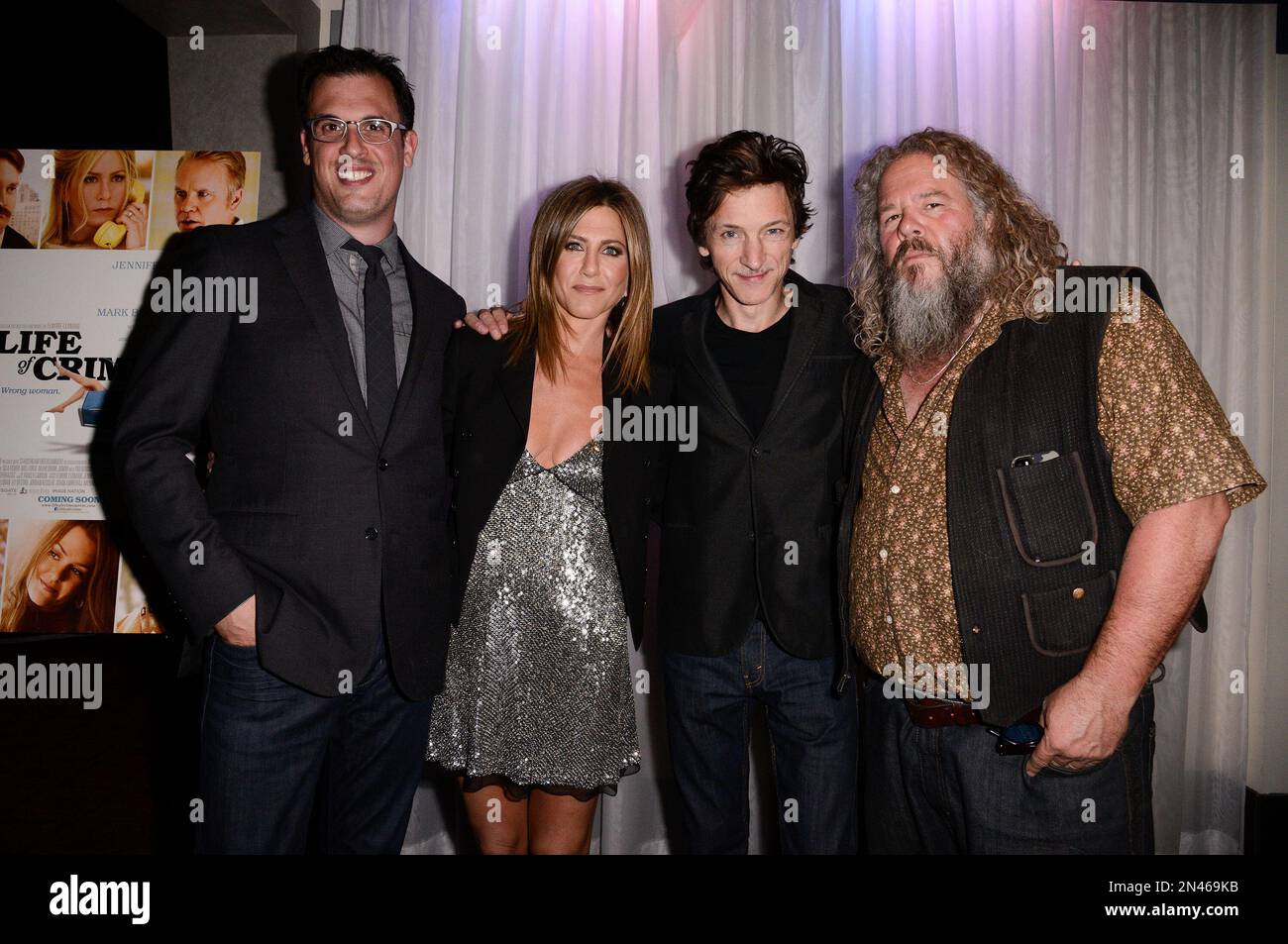 From left to right, director Dan Schechter, actress Jennifer Aniston ...