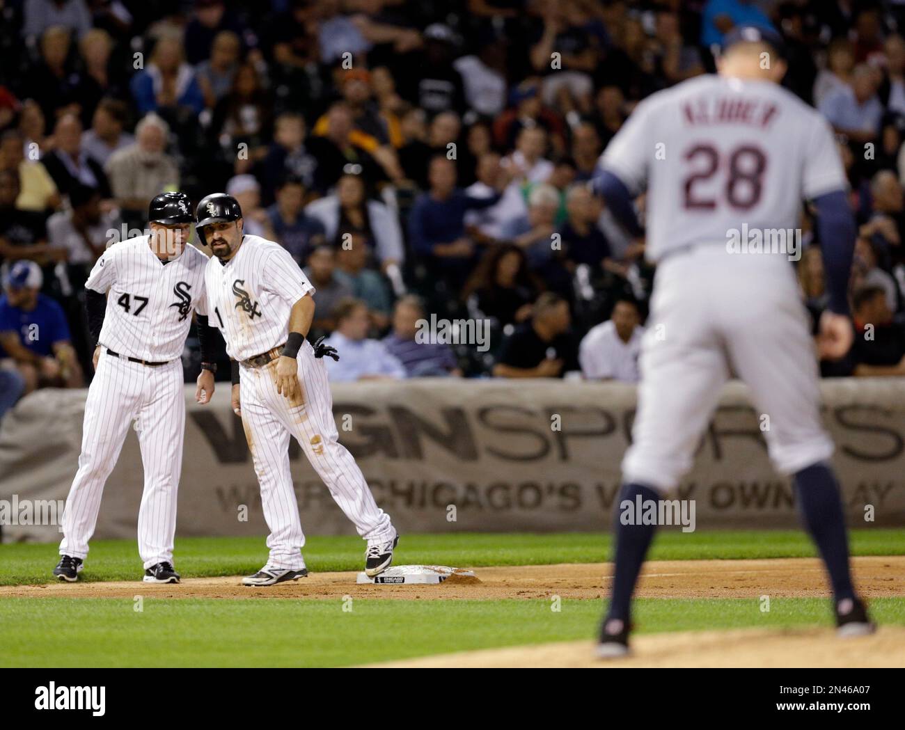 Chicago White Sox third base coach Joe McEwing, left, talks to Adam ...