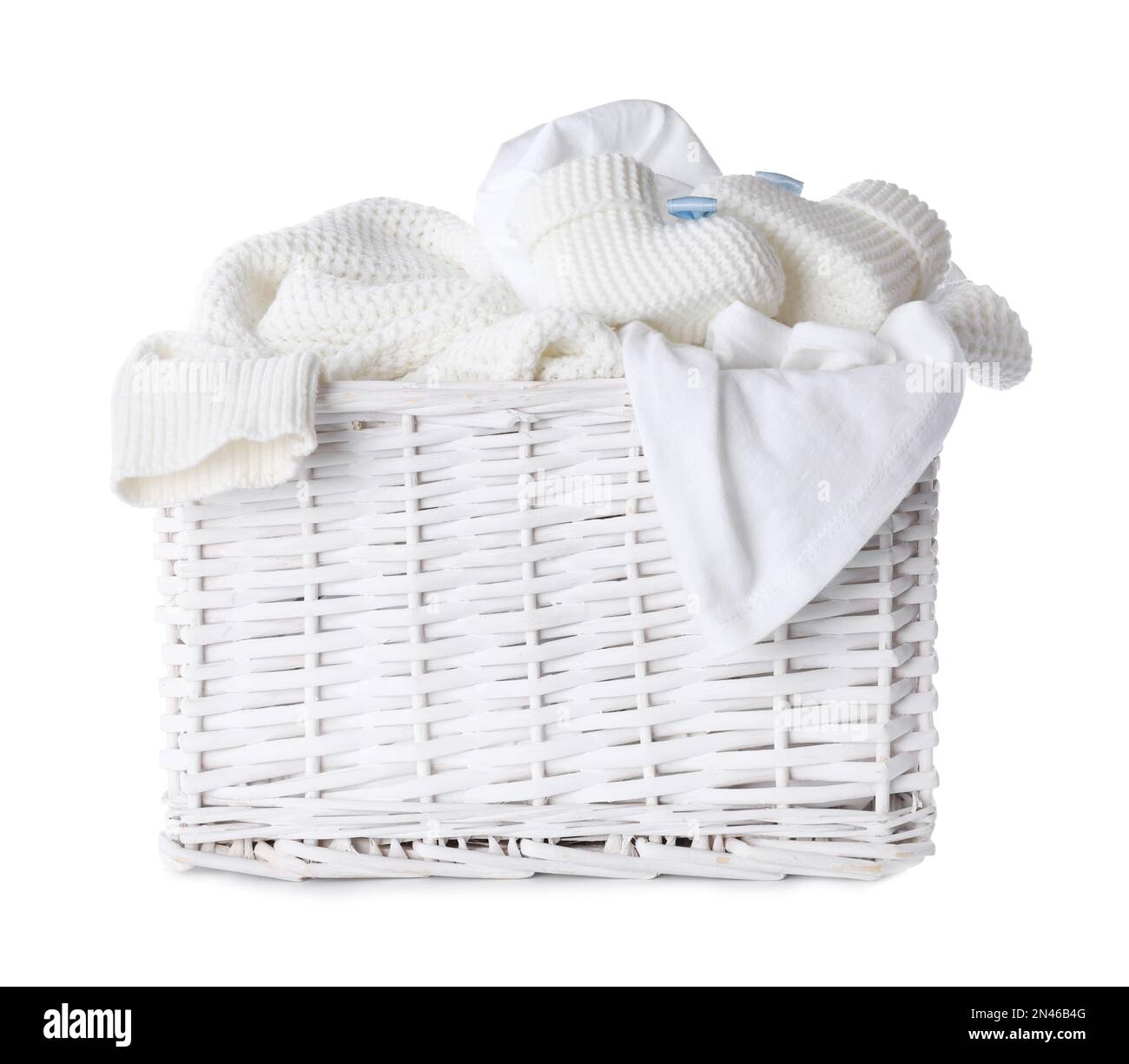 Laundry basket with dirty clothes on white background Stock Photo - Alamy
