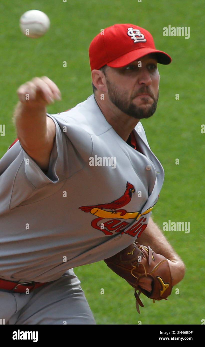 St. Louis Cardinals starting pitcher Adam Wainwright throws against the ...