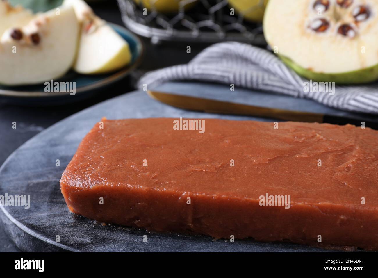 Delicious quince paste on board, closeup view Stock Photo - Alamy
