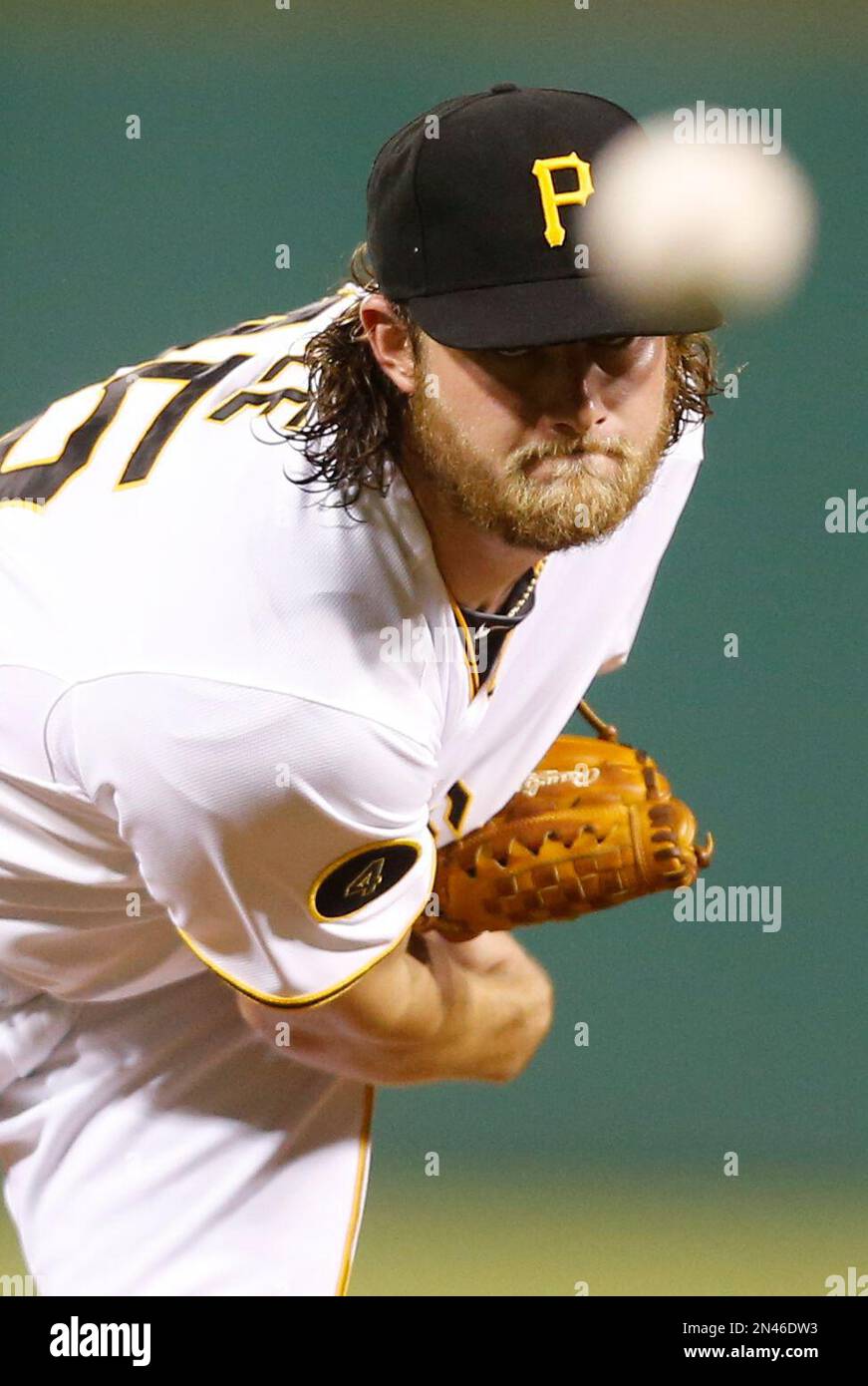 Pittsburgh Pirates starting pitcher Gerrit Cole throws his warmup ...