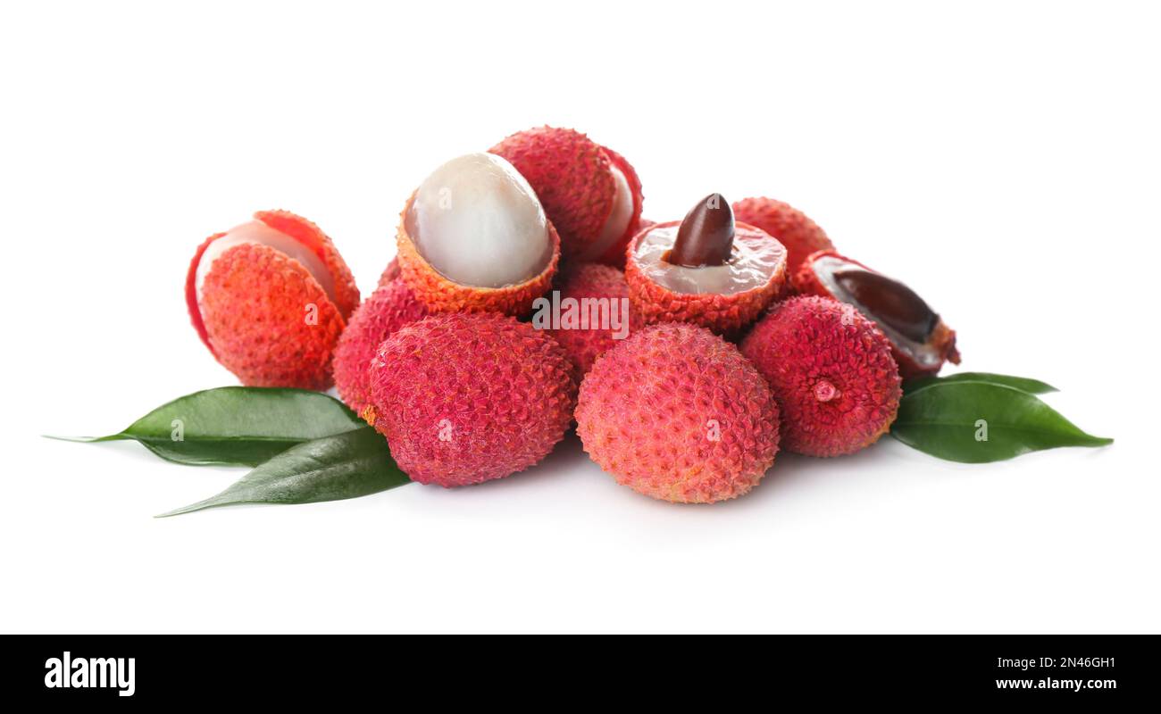Pile of fresh ripe lychees with green leaves on white background Stock ...