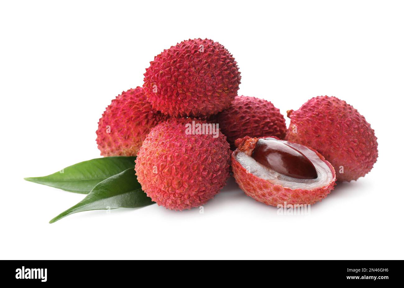 Pile of fresh ripe lychees with green leaves on white background Stock ...