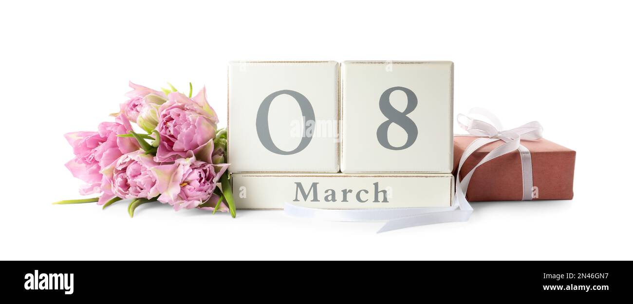 Wooden block calendar with date 8th of March, gift and tulips on white ...
