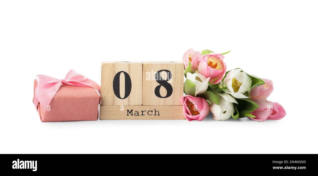 Wooden block calendar with date 8th of March, tulips and gift box on ...