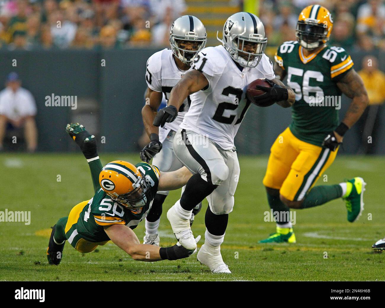 Oakland Raiders running back Maurice Jones-Drew breaks the tackle of ...