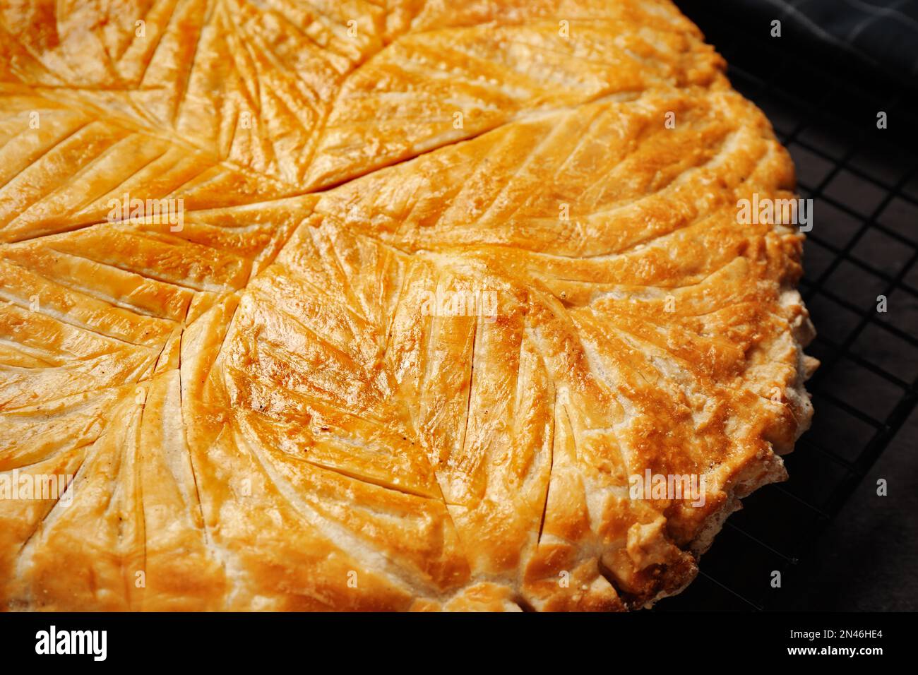 Traditional galette des rois on cooling rack, closeup Stock Photo - Alamy