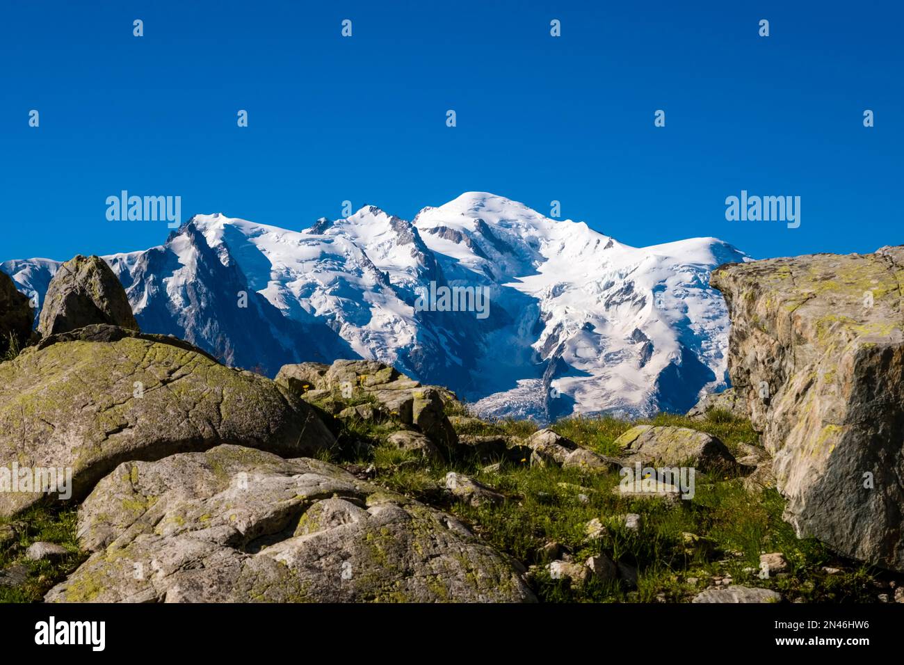 The summits of Aiguille du Midi, Mont Blanc du Tacul, Mont Maudit, Mont Blanc and Dome du ...