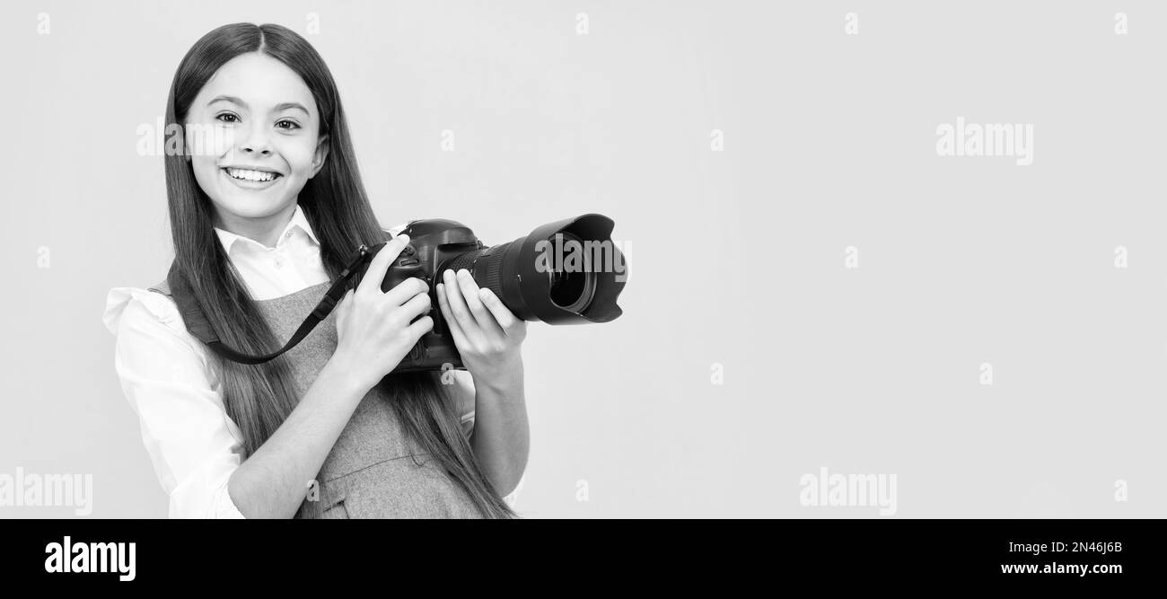 happy teen girl photographer use digital photo camera, photographing ...