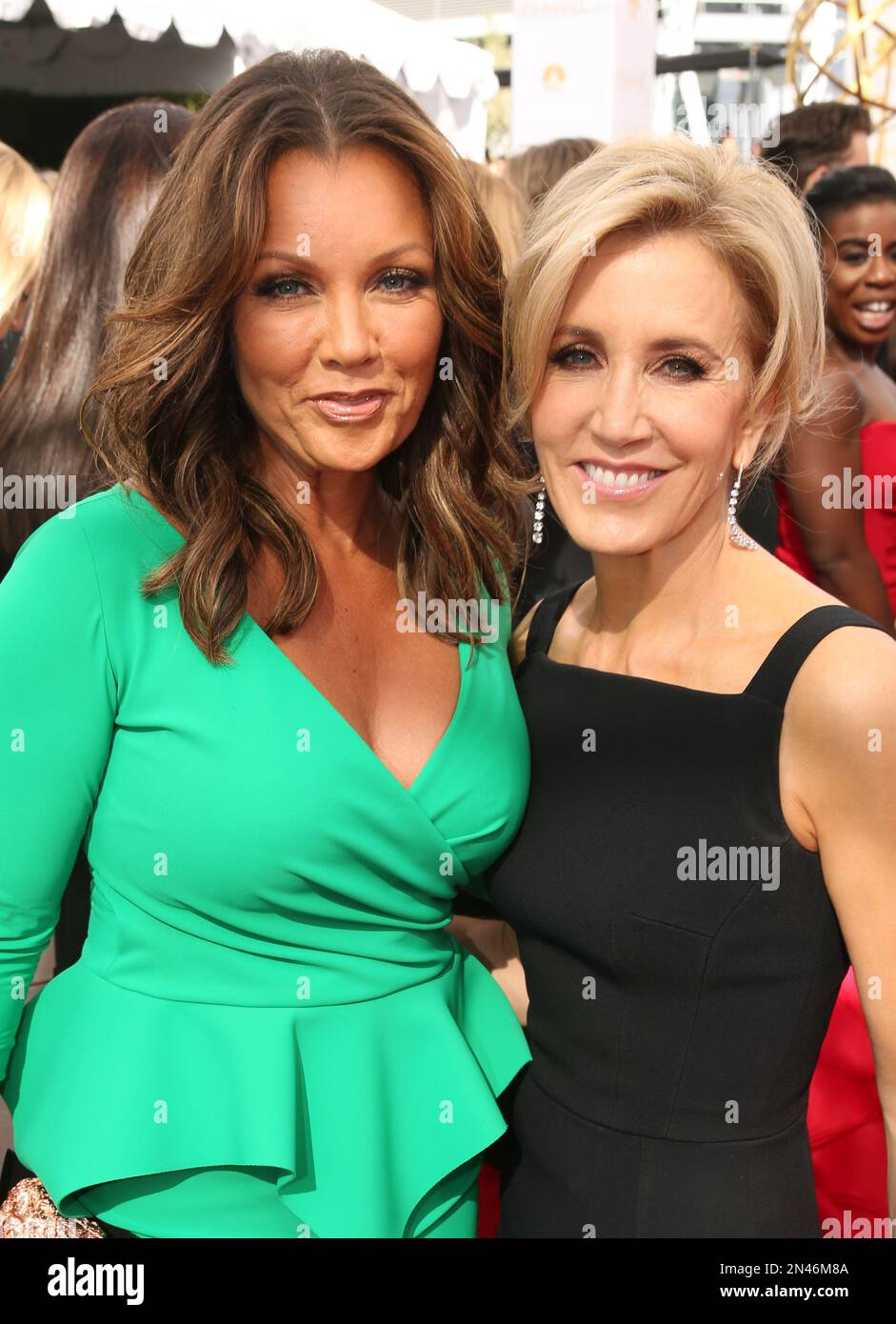 Vanessa Williams, left, and Felicity Huffman arrive at the 66th ...