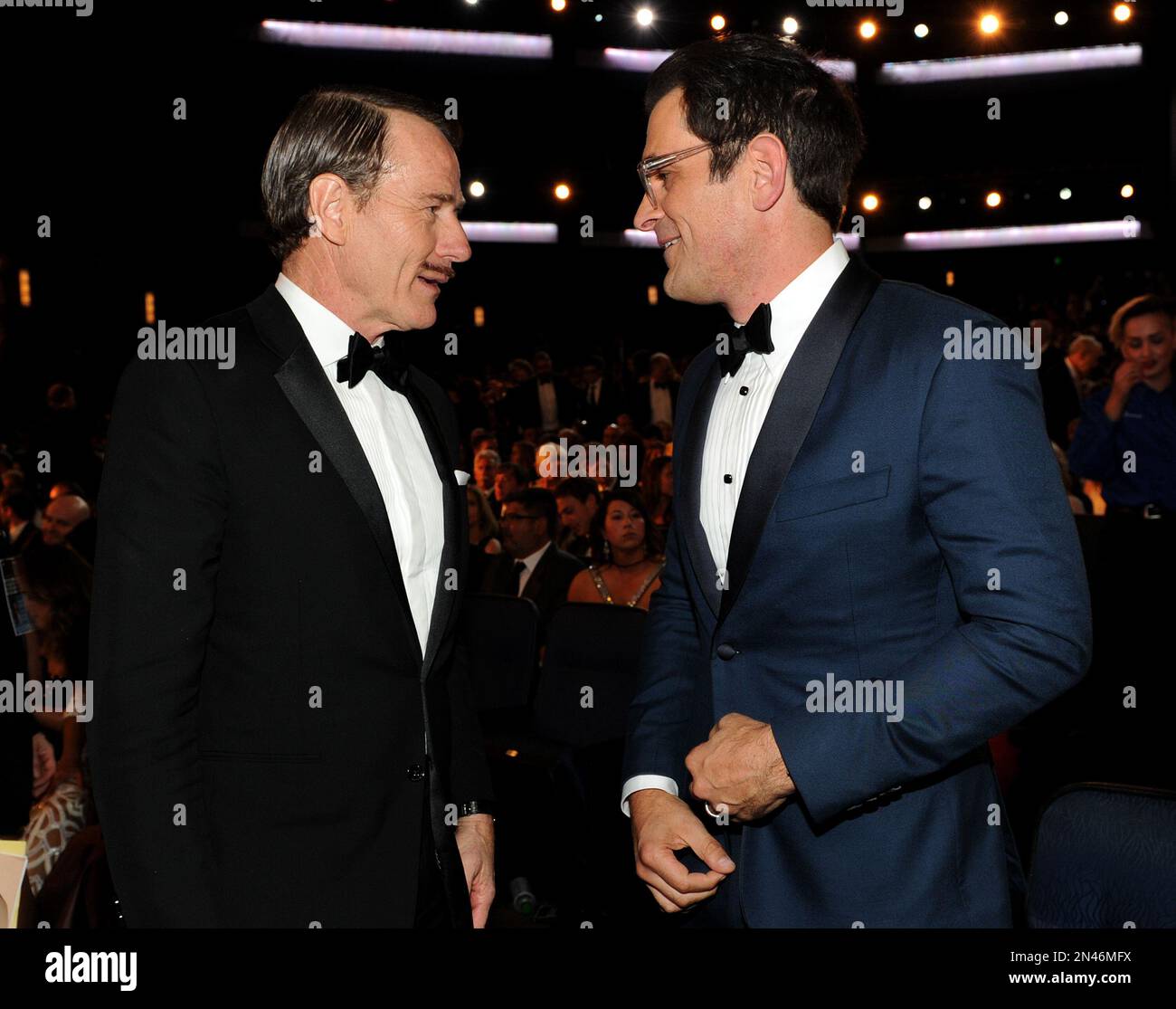 EXCLUSIVE - Actors Bryan Cranston, left, and Ty Burrell in the audience ...