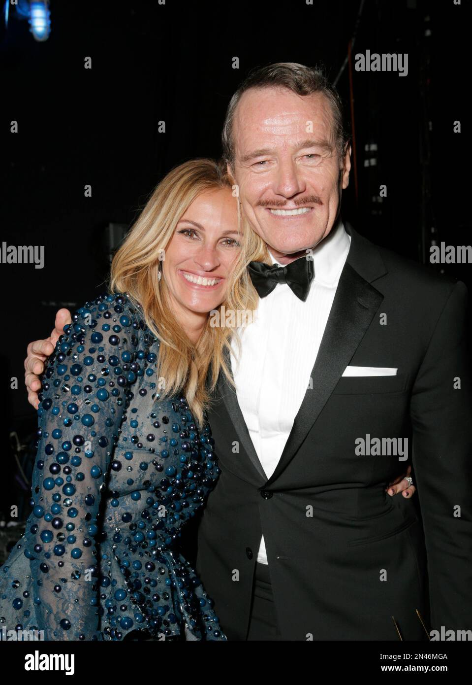 Actress Julia Roberts, left, and actor Bryan Cranston backstage at the ...