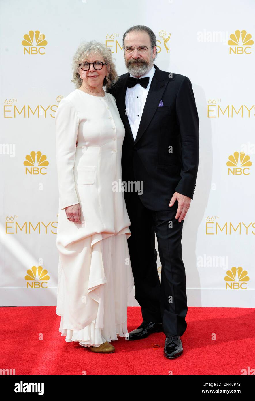 Kathryn Grody, left, and Mandy Patinkin arrive at the 66th Primetime ...