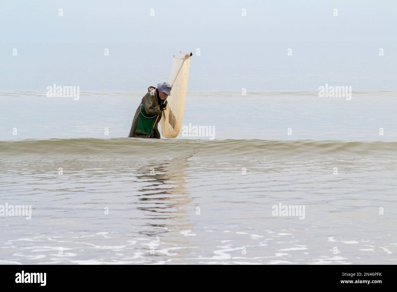 Traditional shrimper with a shrimp net Stock Photo - Alamy