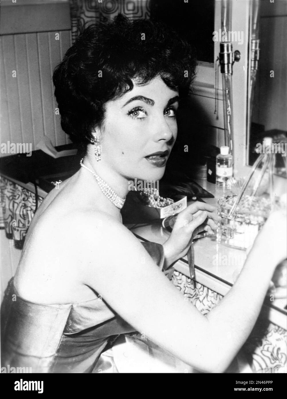 ELIZABETH TAYLOR in her Dressing Room at MGM Studios in 1953 publicity ...