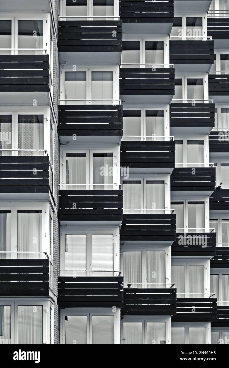 Abstract black and white shot of exterior of uniformly designed ...