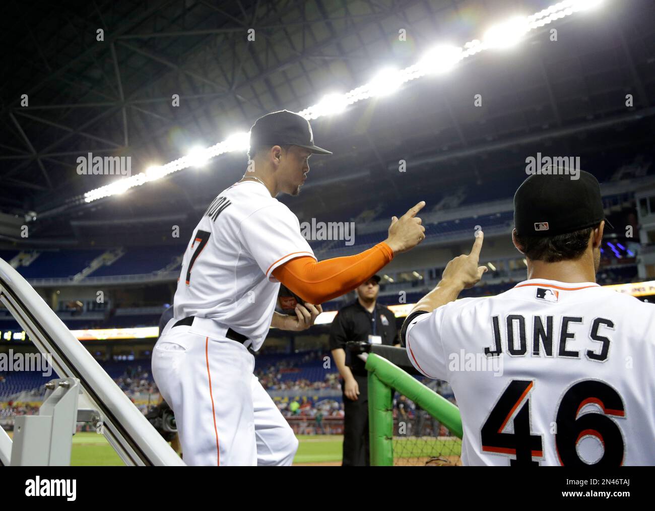 Miami Marlins right fielder Giancarlo Stanton, left, and first baseman ...