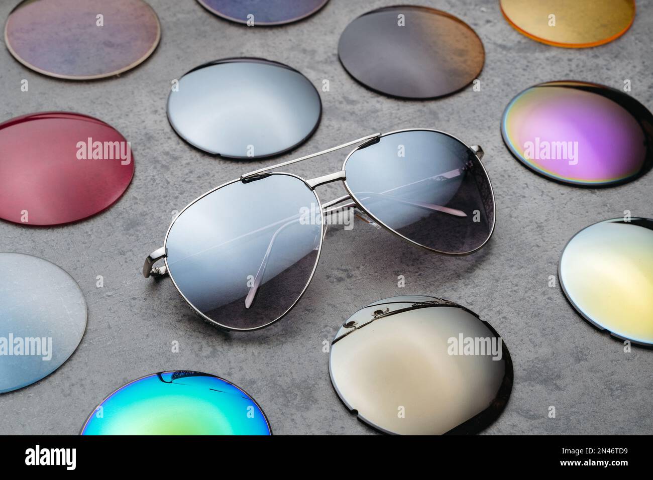 Closeup of assortment of different colored optical corrective lenses ...