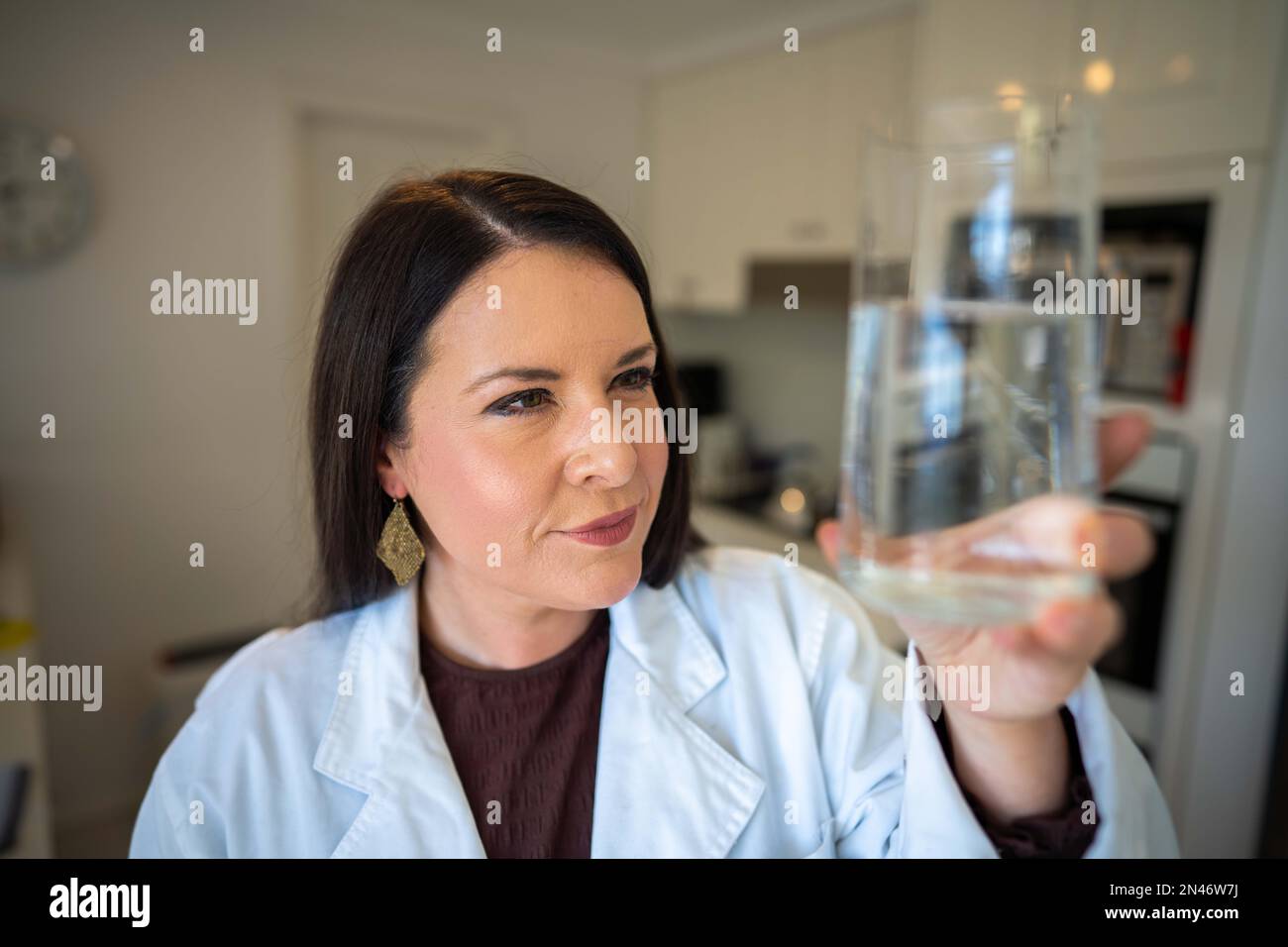 Soil test, female agricultural scientist conducting a soil test in a ...