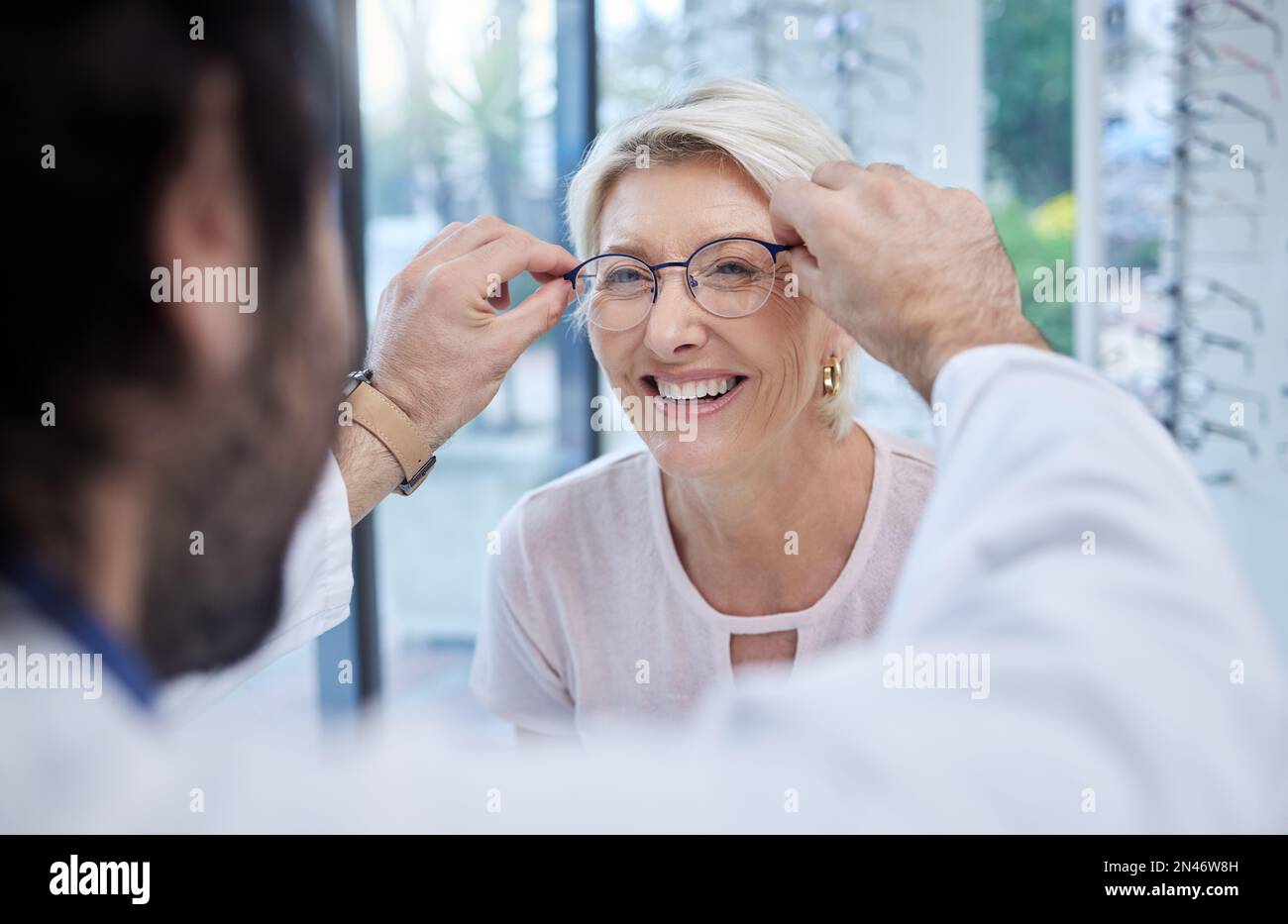 Optometrist, glasses and woman with smile in store for vision, eyesight ...