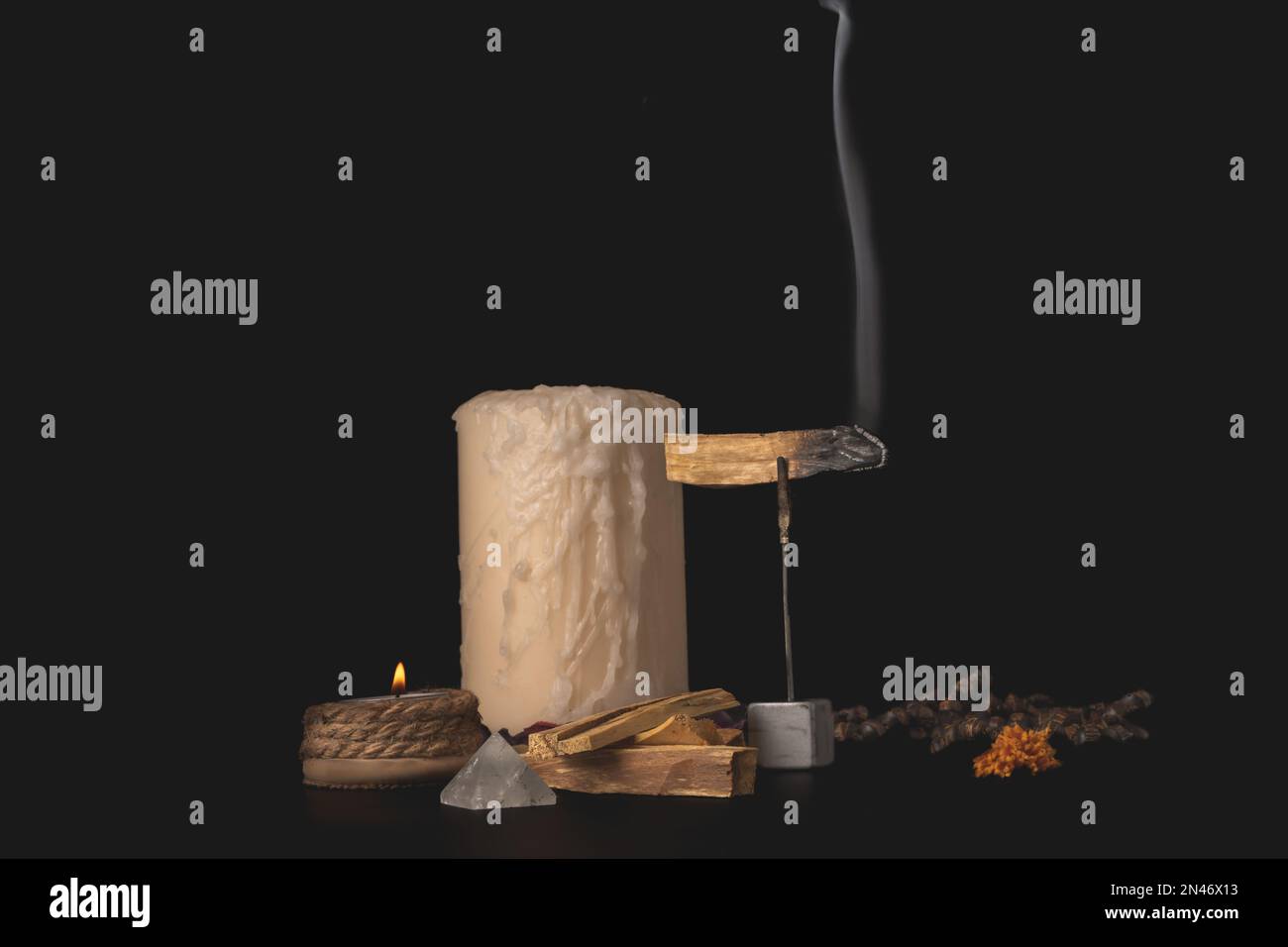 zen image of smoking palo santo,, holy stick with candles and japa-mala ...