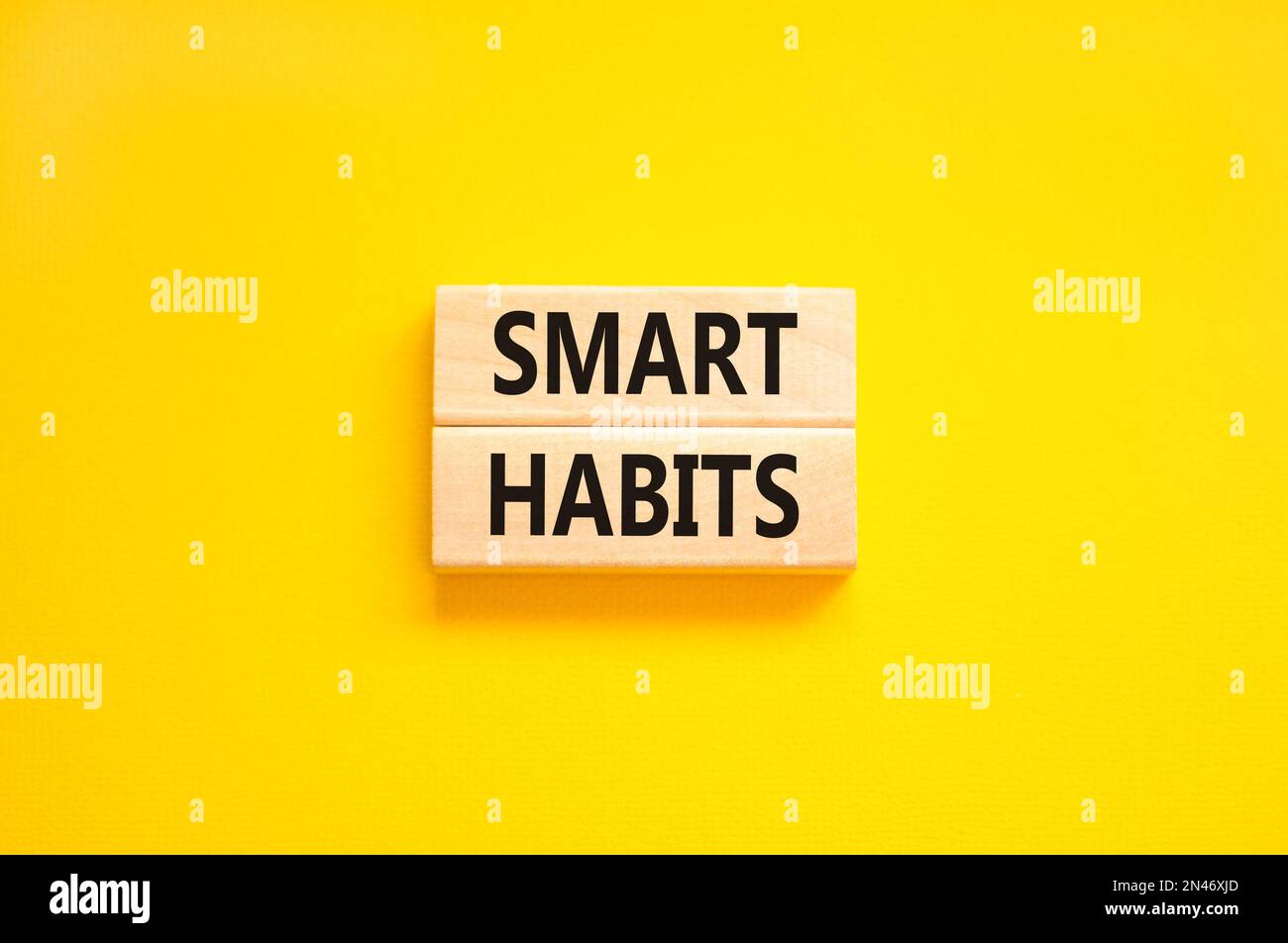Smart habits symbol. Concept words Smart habits on wooden blocks. Beautiful yellow table yellow ...