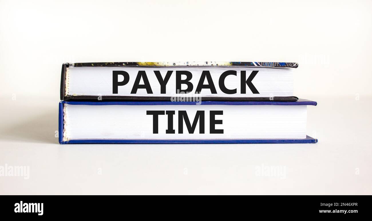 Payback time symbol. Concept words Payback time on books. Beautiful ...