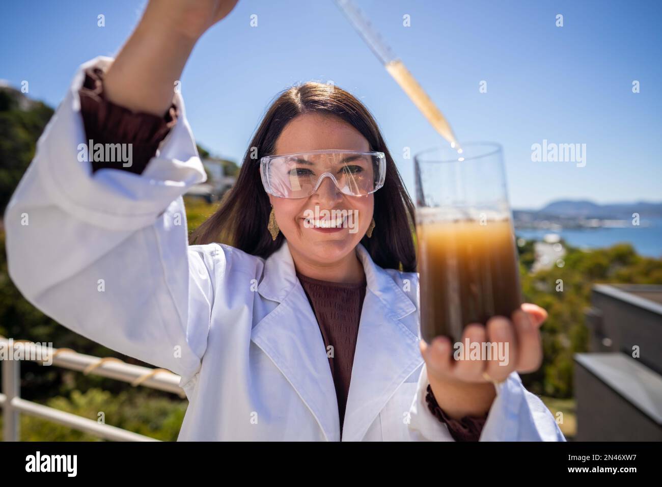 Soil test, female agricultural scientist conducting a soil test in a ...