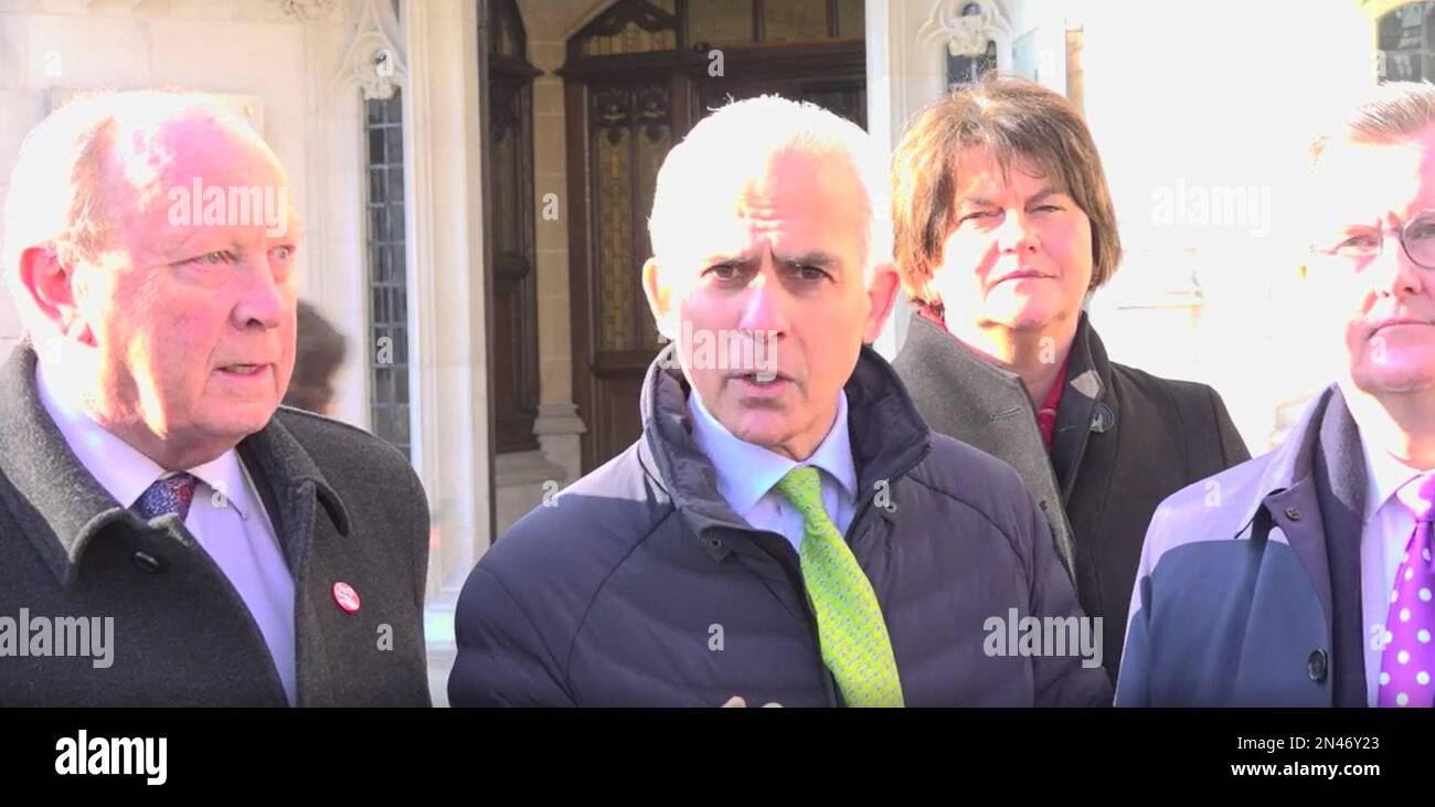 A still taken from PA video of (left to right) TUV leader Jim Allister ...