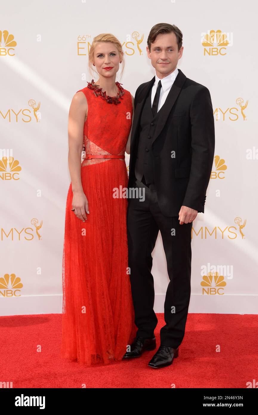 Claire Danes, left, and Hugh Dancy arrive at the 66th Primetime Emmy ...