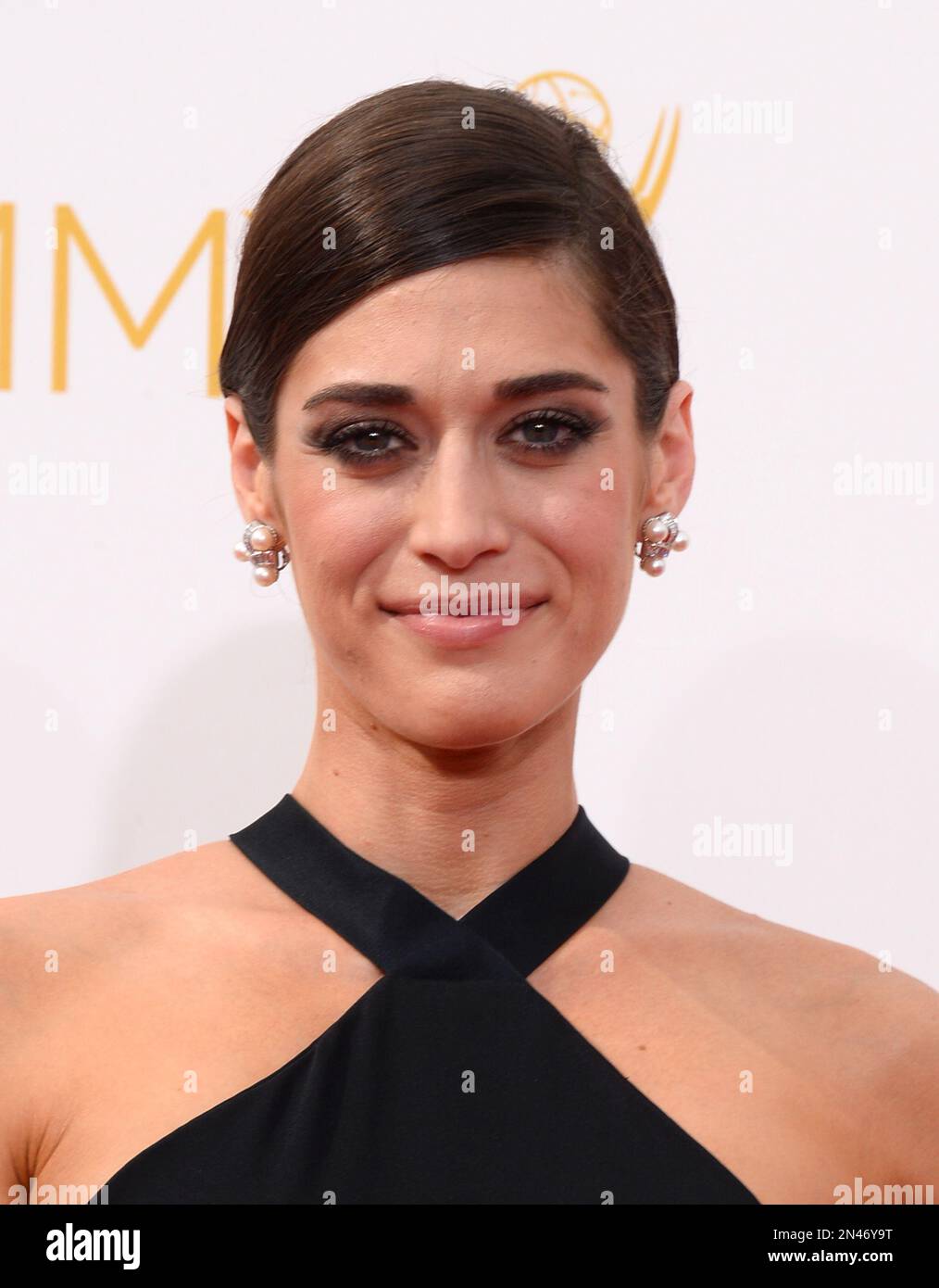 Lizzy Caplan arrives at the 66th Annual Primetime Emmy Awards at the ...