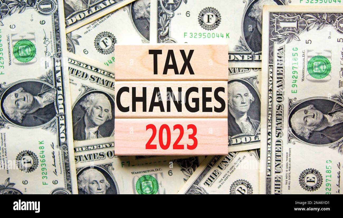 Tax changes 2023 symbol. Concept words Tax changes 2023 on wooden ...