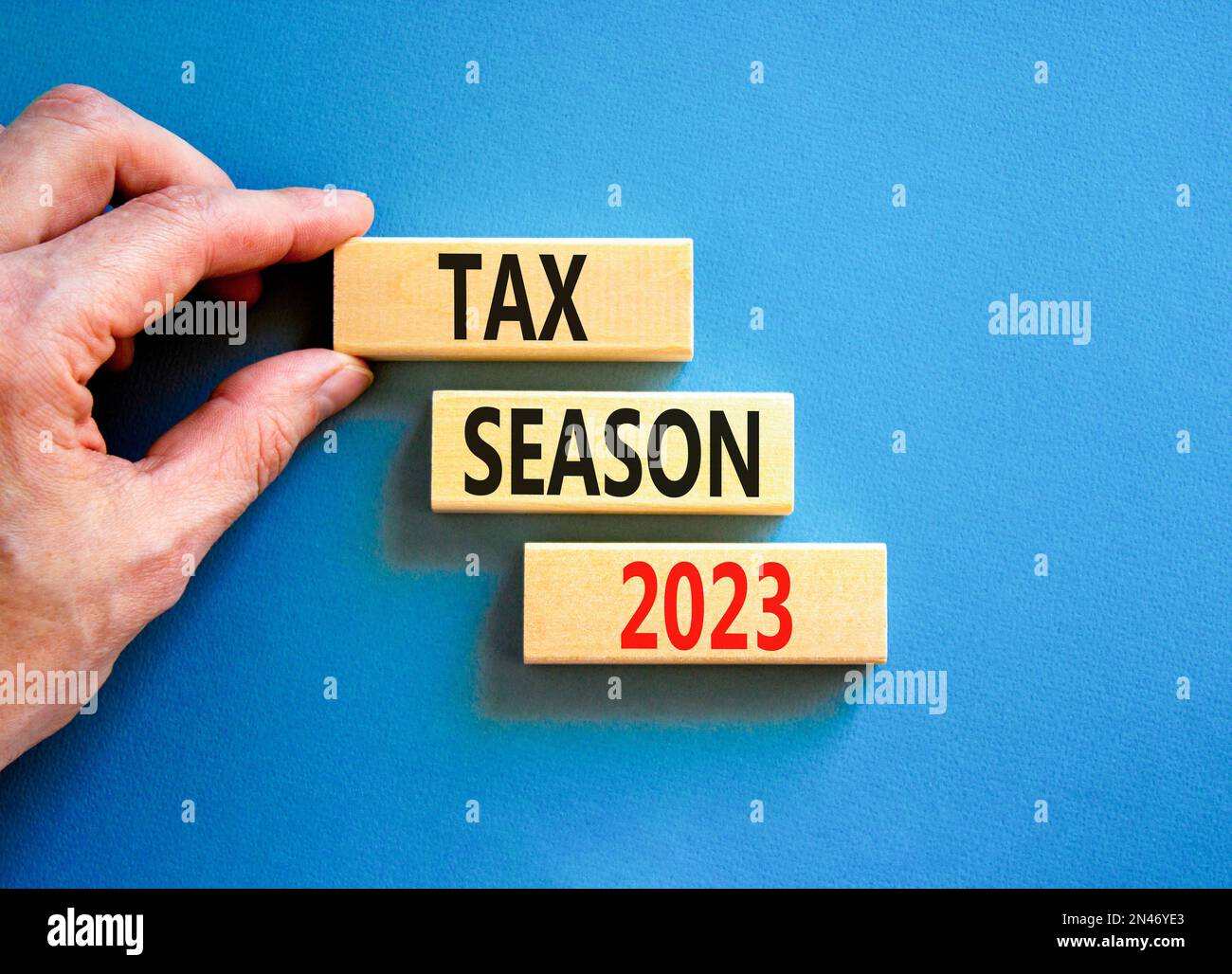 Tax season 2023 symbol. Concept words Tax season 2023 on wooden blocks ...