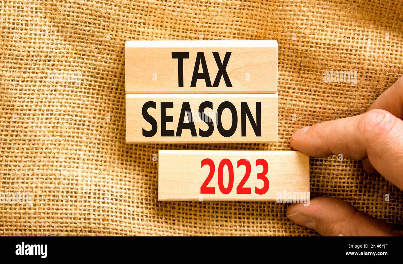 Tax season 2023 symbol. Concept words Tax season 2023 on wooden blocks ...