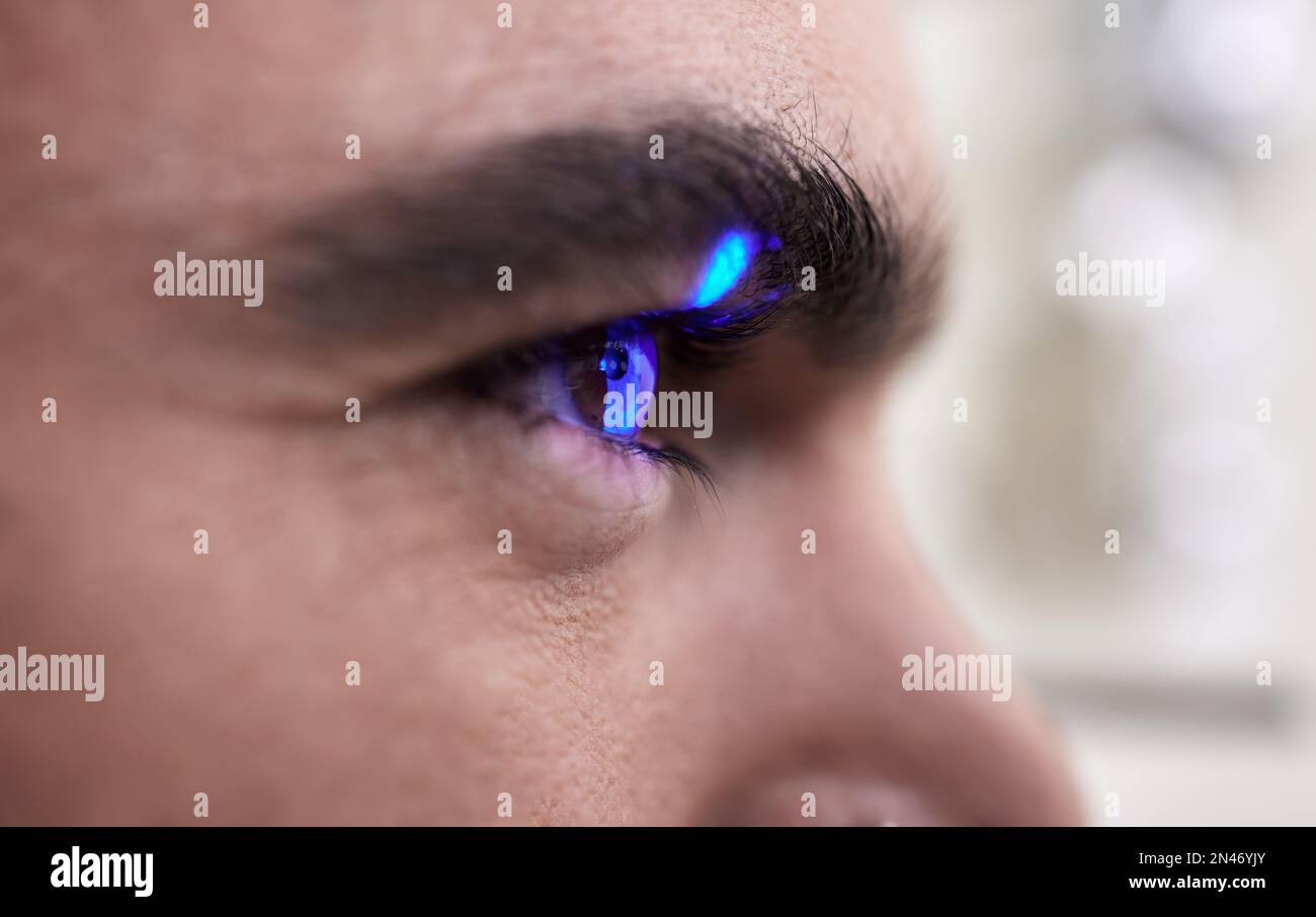 Eye exam, vision or laser test for customer with a machine at optometry ...