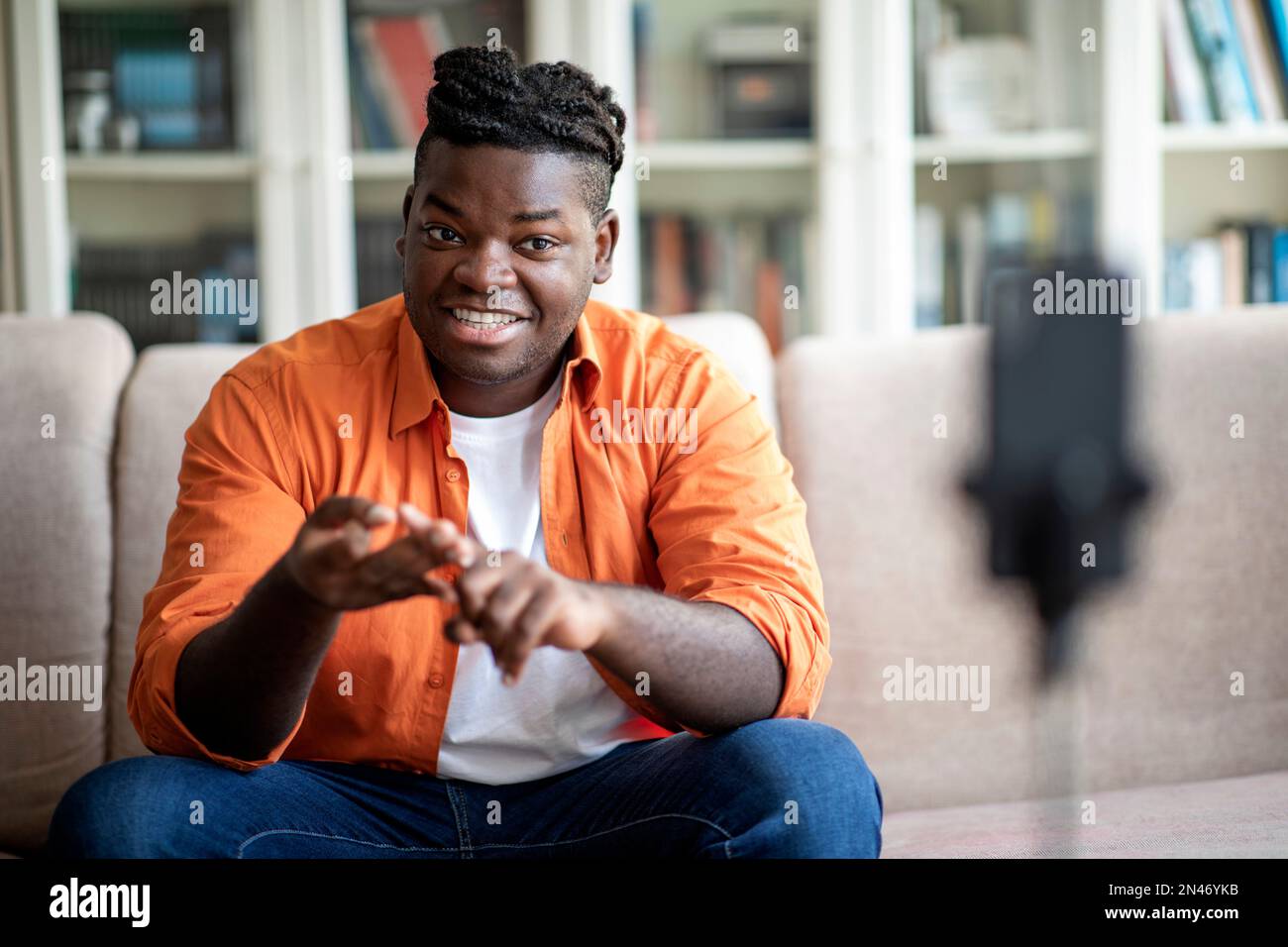 Cheerful black guy famous hi-res stock photography and images - Alamy