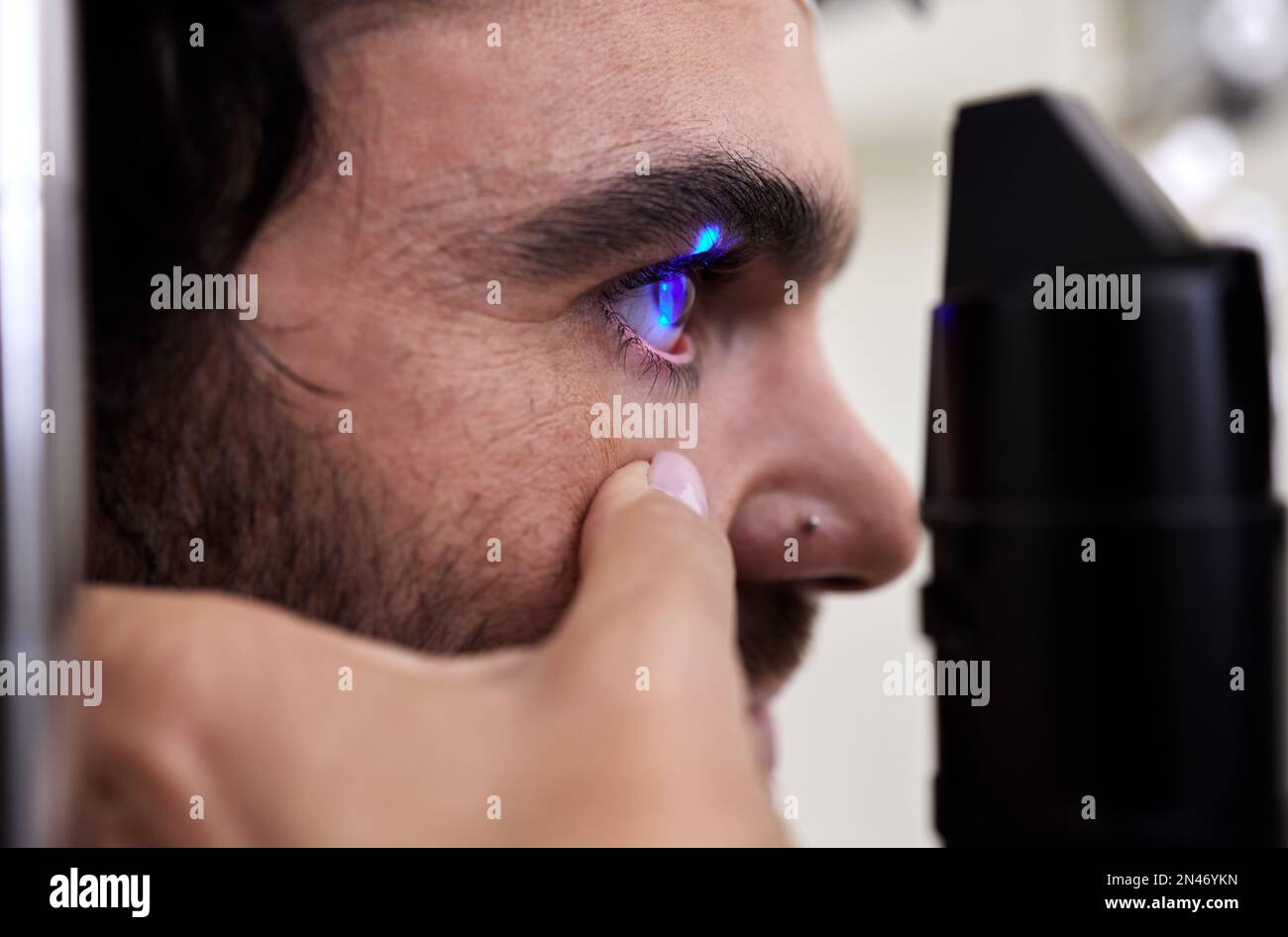 Eye exam, vision or laser test for patient with machine at optometry ...