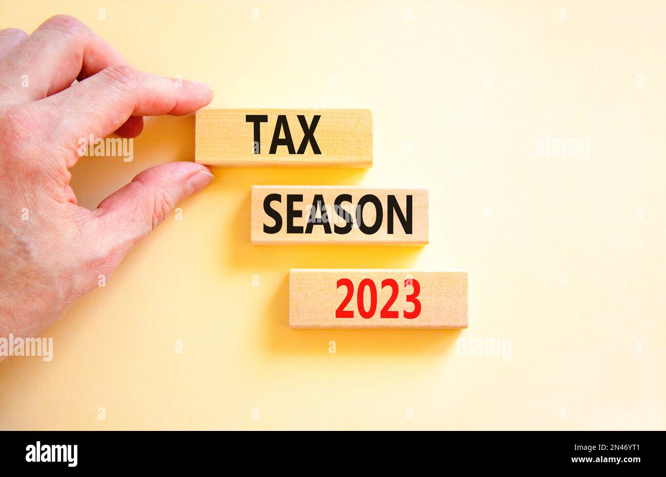 Tax season 2023 symbol. Concept words Tax season 2023 on wooden blocks ...