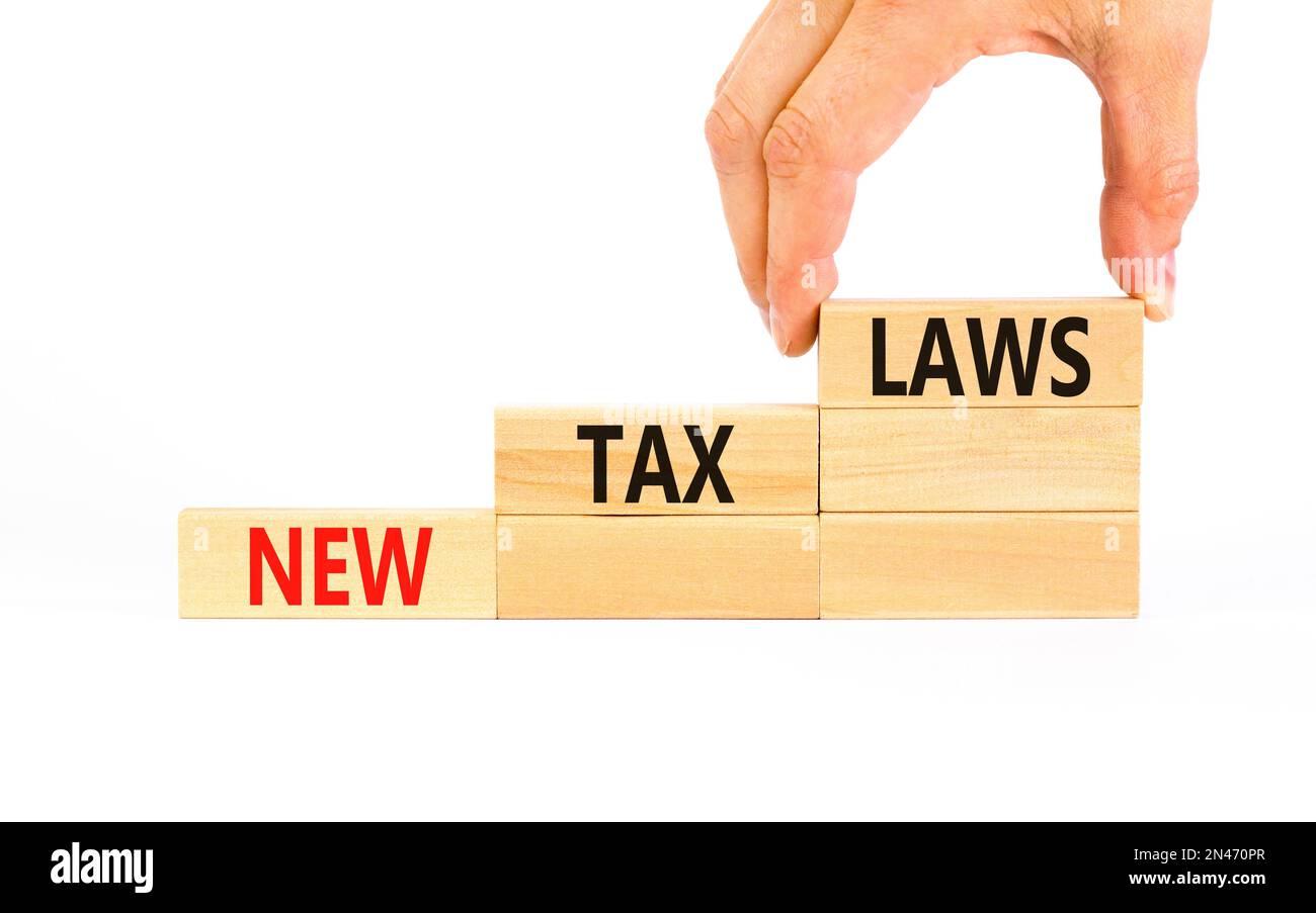 New tax laws symbol. Concept words New tax laws on wooden blocks on a ...