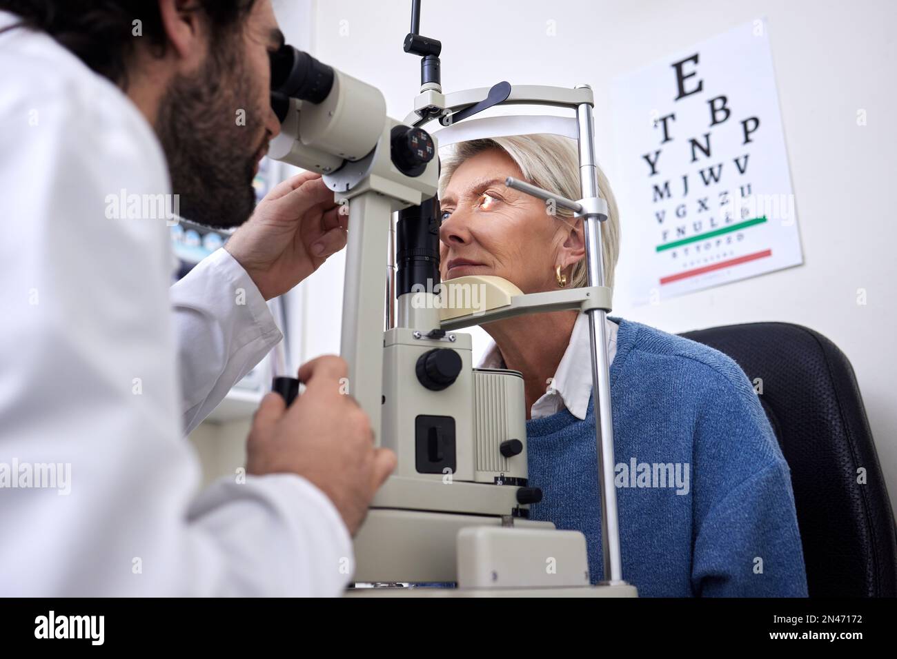 Vision, machine exam and woman with an optometrist for a check, eye ...