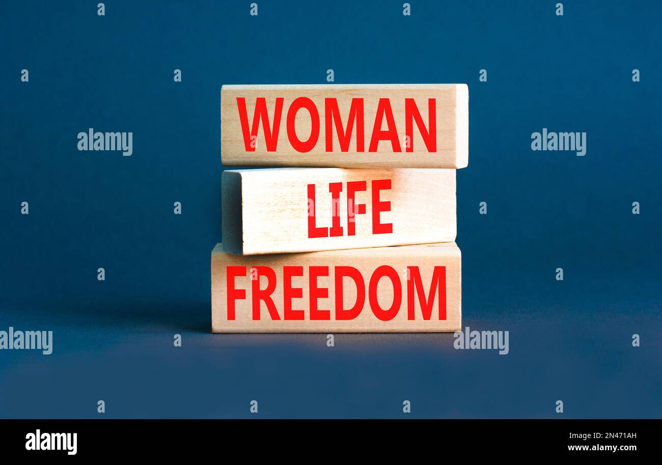 Woman life freedom symbol. Concept words Woman Life Freedom on wooden ...