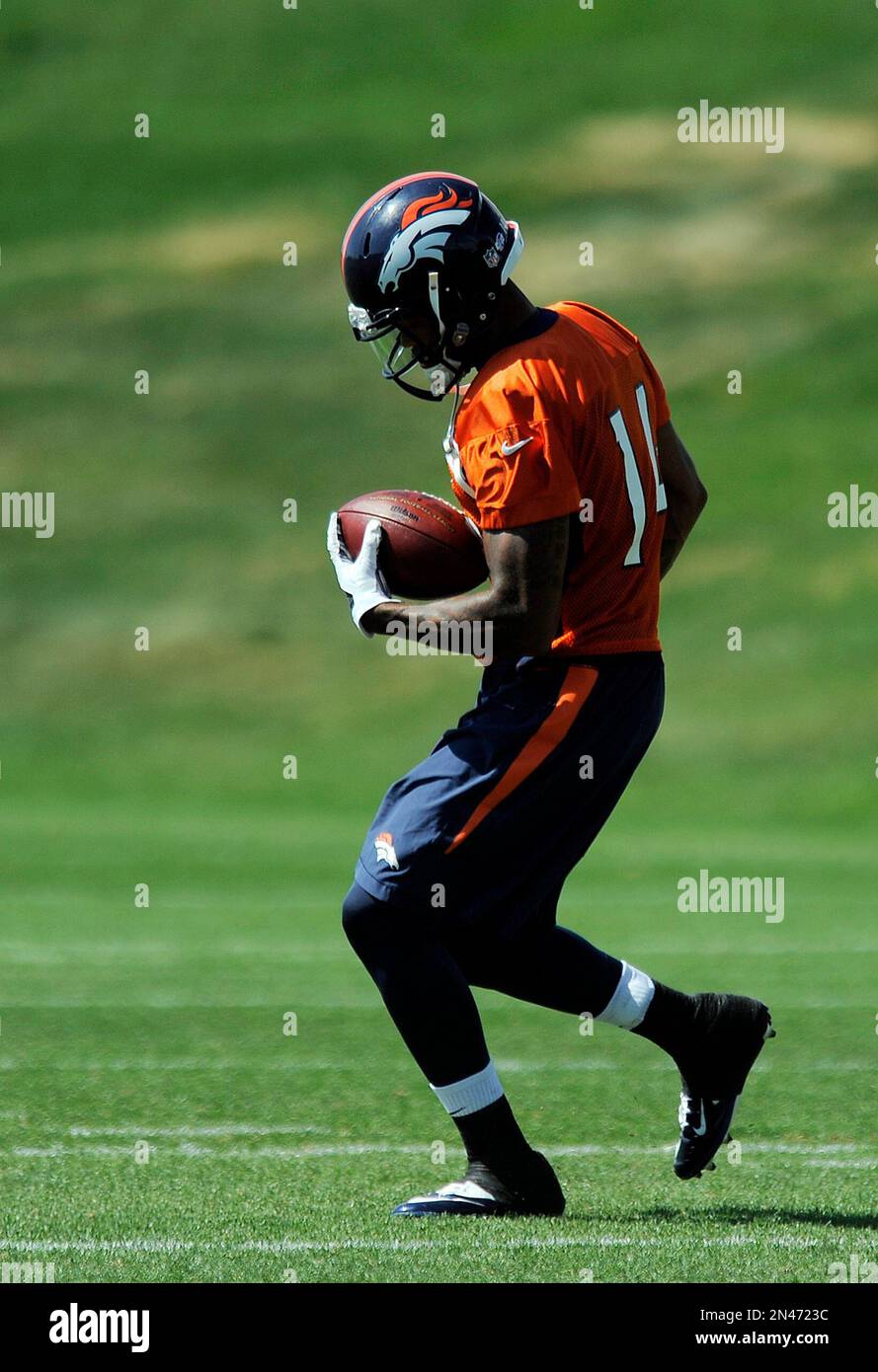 Denver Broncos wide receiver Cody Latimer catches a pass during a drill ...