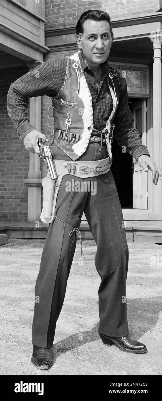 Native American actor and quick-draw expert Rodd Redwing demonstrates ...