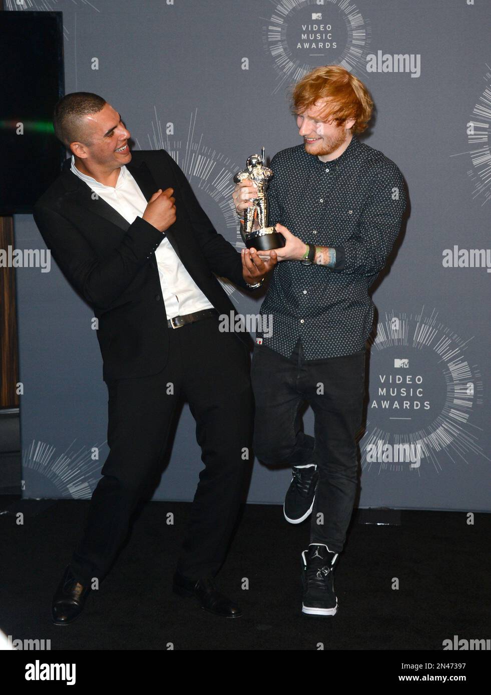 Emil Nava, left, and Ed Sheeran pose with the award for Best Male Video ...