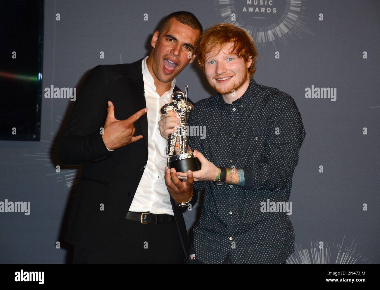 Emil Nava, left, and Ed Sheeran pose with the award for Best Male Video ...