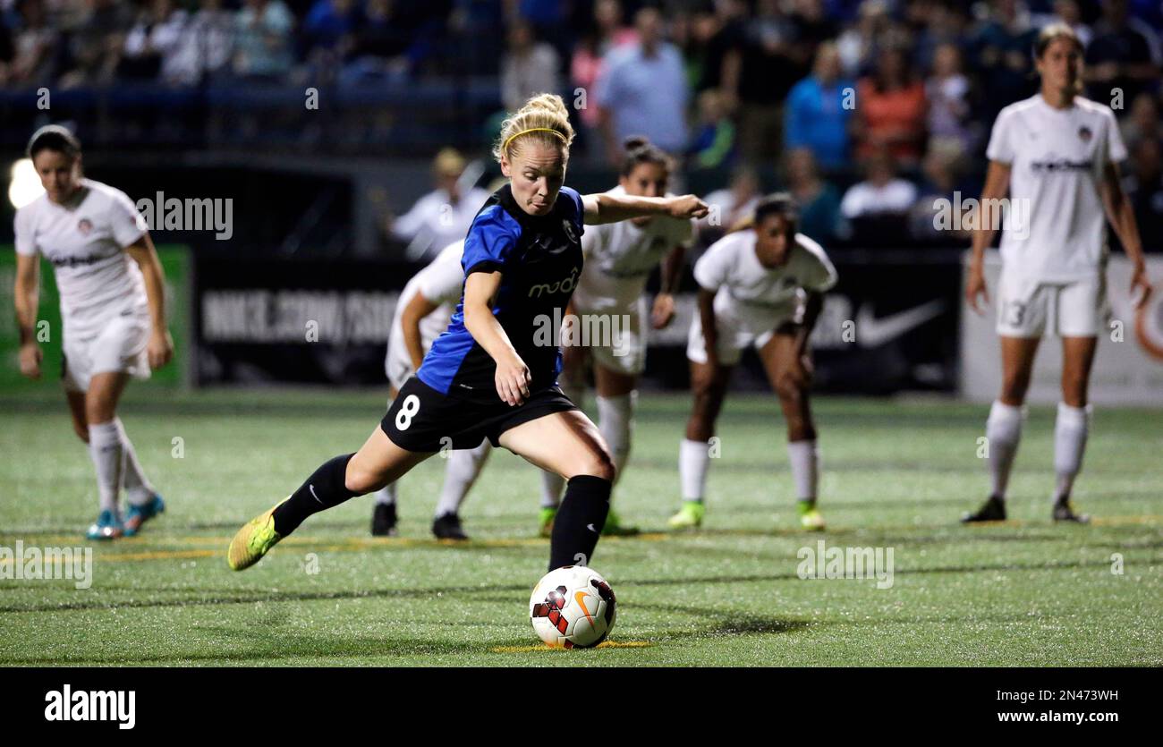 Seattle Reign FC's Kim Little (8) shoots a penalty kick against the ...