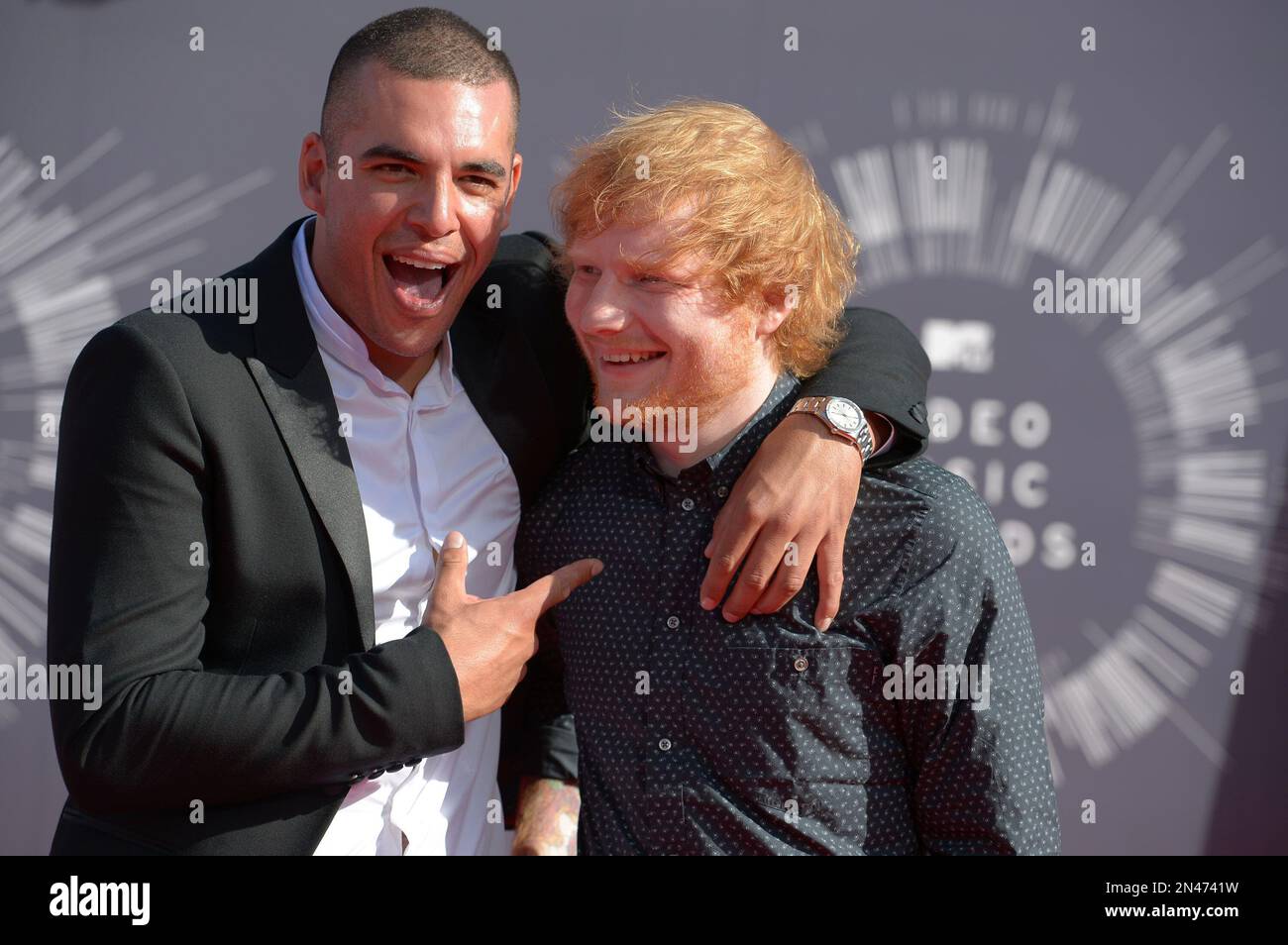 Emil Nava, left, and Ed Sheeran arrive at the MTV Video Music Awards at ...
