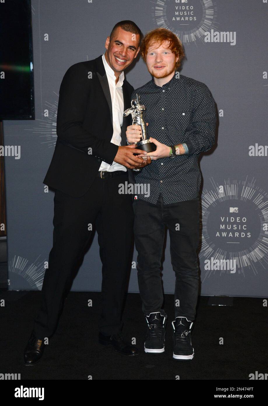 Emil Nava, left, and Ed Sheeran pose with the award for Best Male Video ...