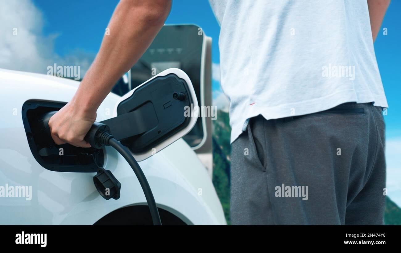 Installing electric vehicle charger hi-res stock photography and images ...